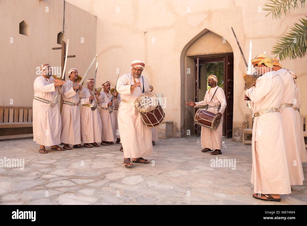 Traditional omani sword dance hi-res stock photography and images - Alamy