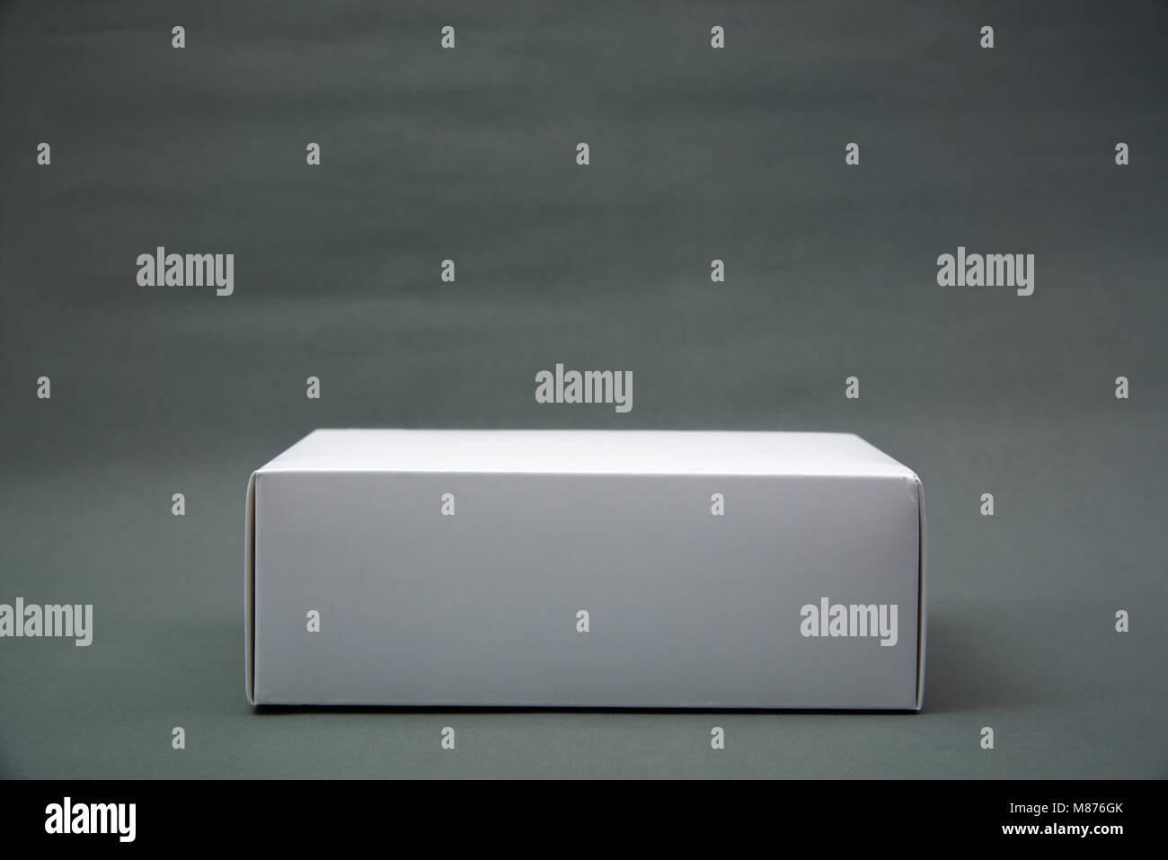 Empty Package white cardboard box or tray mock up for product on grey ...