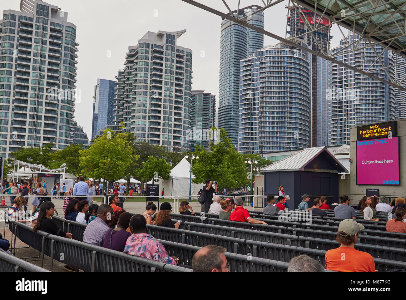 Audience listening to live music at the Harbourfront Centre, Toronto ...