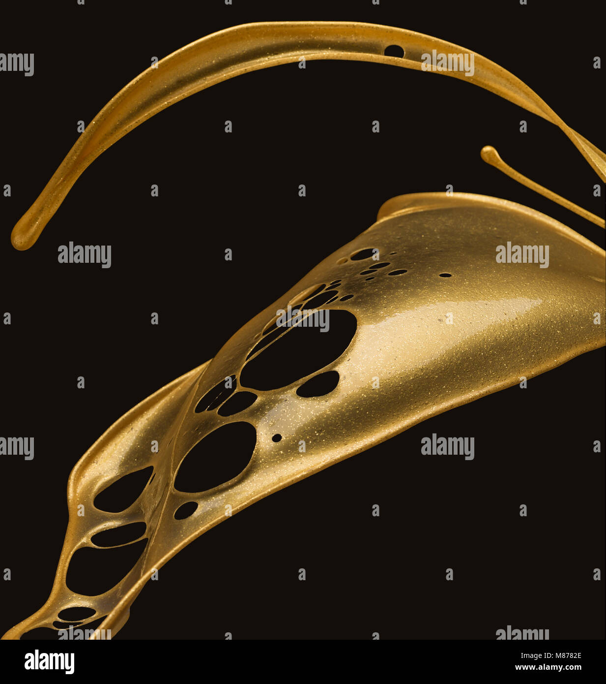 splendid golden splash over black background Stock Photo - Alamy