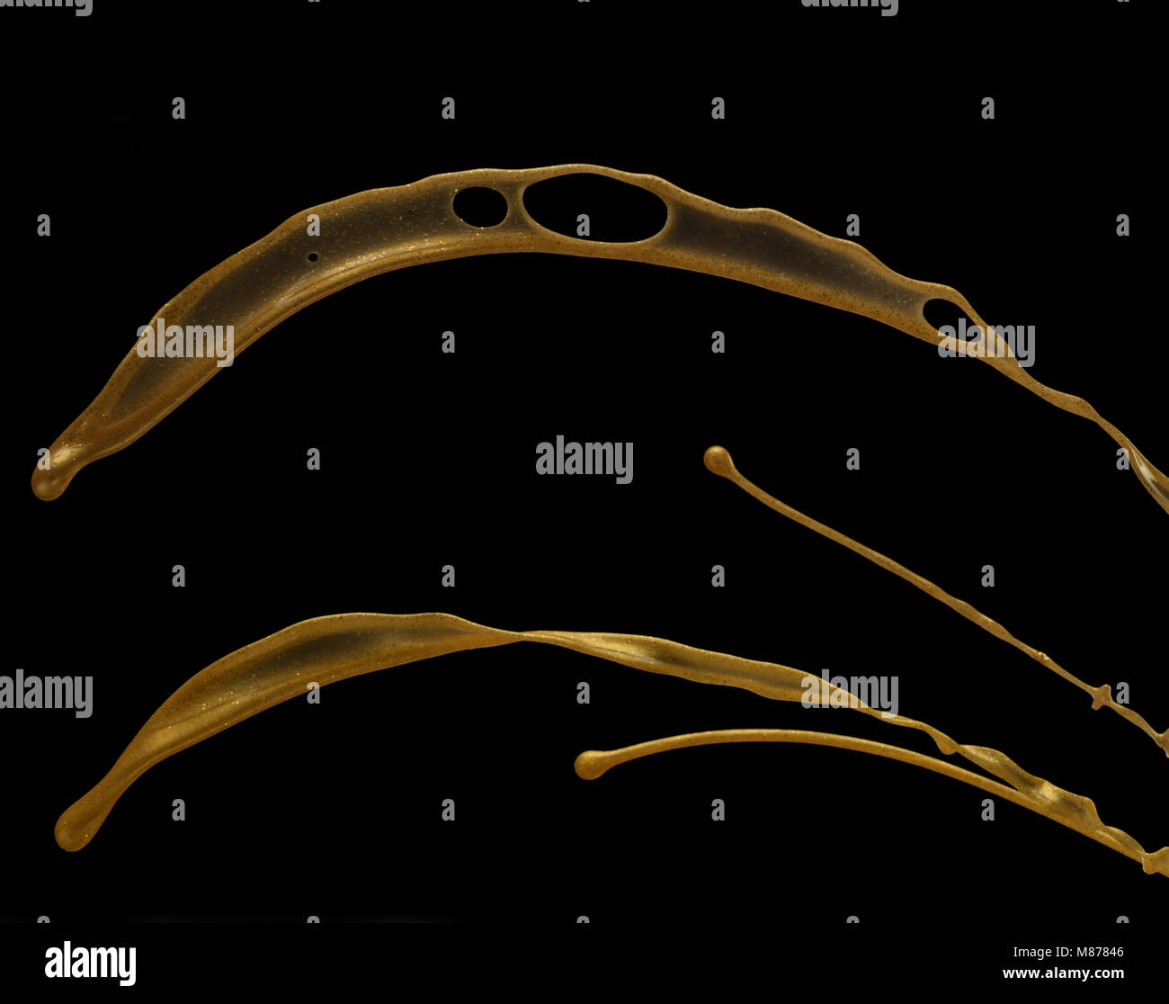 splendid golden splash over black background Stock Photo - Alamy