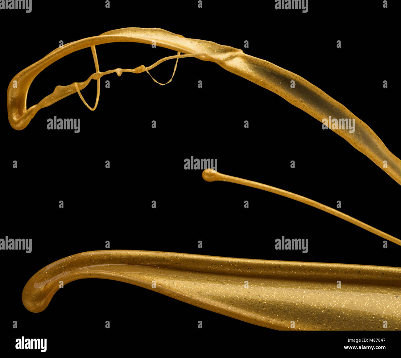 splendid golden splash over black background Stock Photo - Alamy