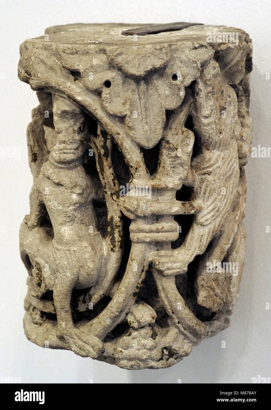 Arch segment. Vine ornament with centaur and bear. Fragment from a ...