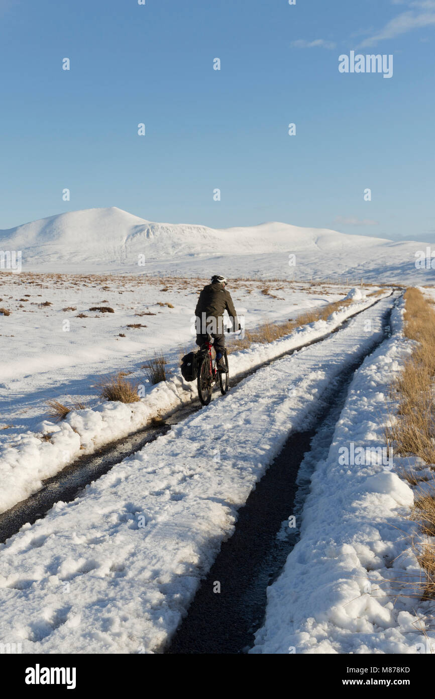 Cycling in Sutherland in winter Stock Photo - Alamy