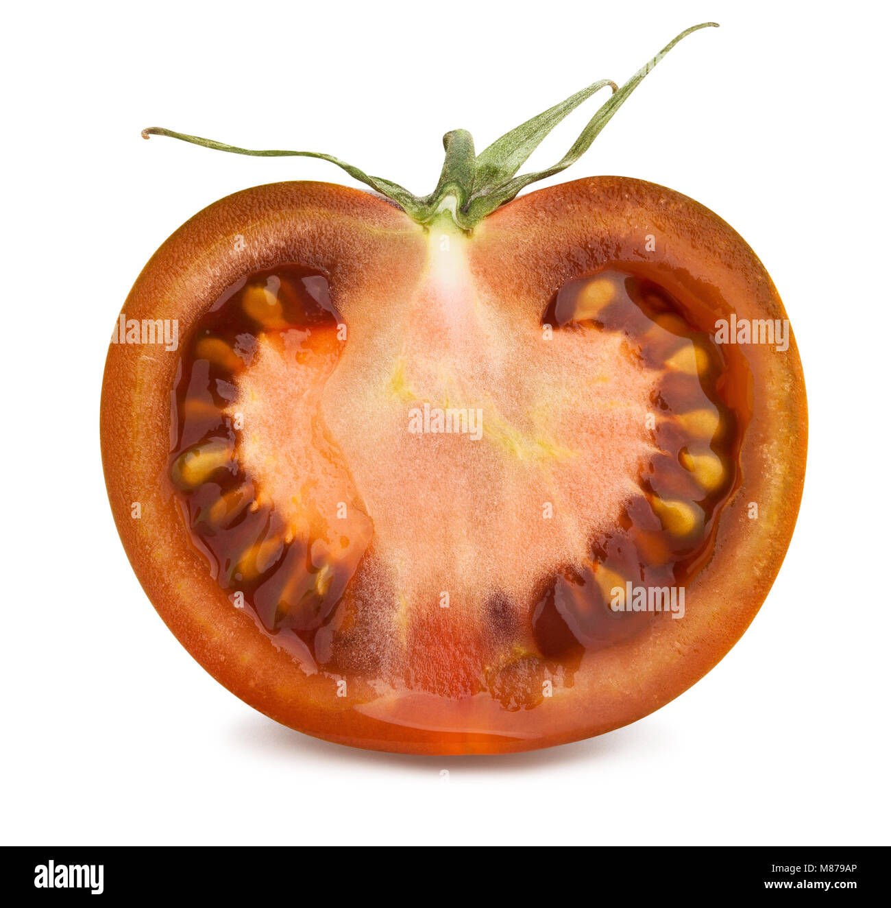 sliced kumato tomato path isolated Stock Photo - Alamy
