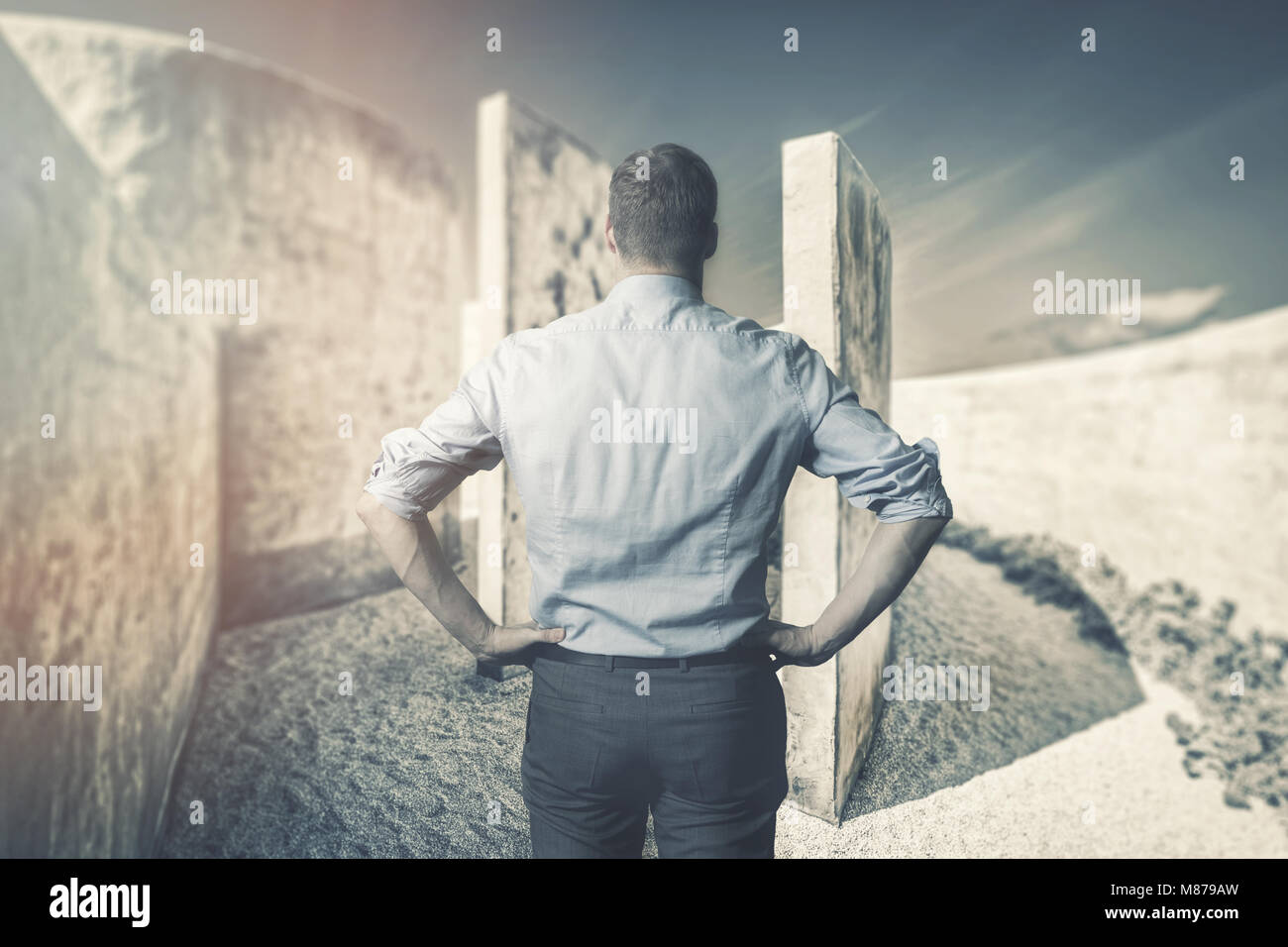 business difficulties and challenges. businessman in front of labyrinth ...