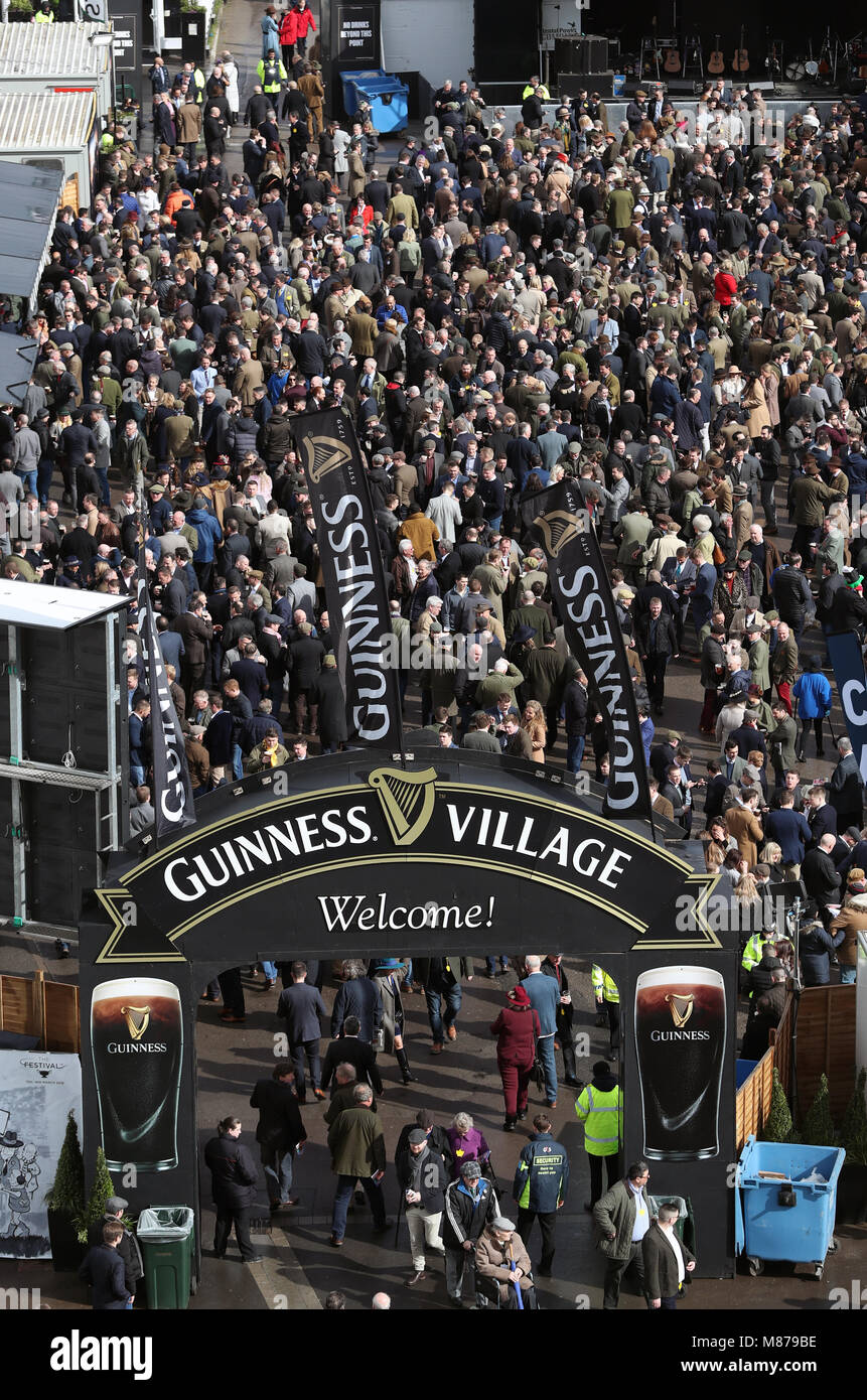 Racegoers gather in Guinness Village during St Patrick's Thursday of ...