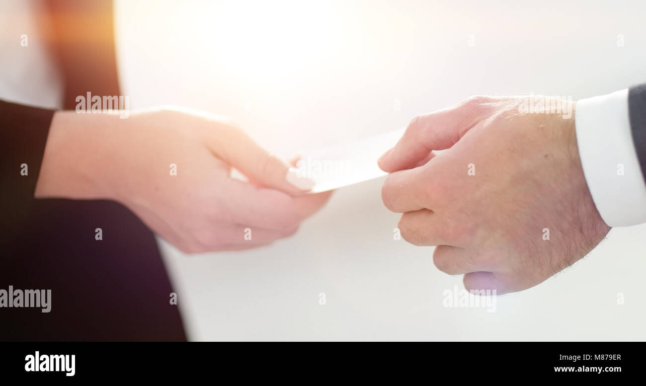 Exchange business card for first time meet Stock Photo - Alamy