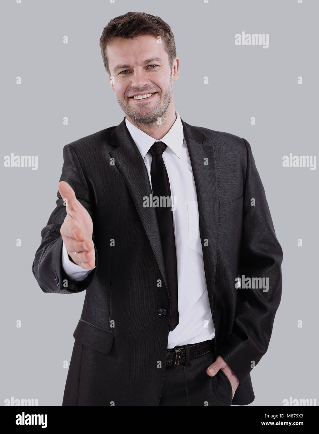 Young man pointing finger inviting hi-res stock photography and images ...