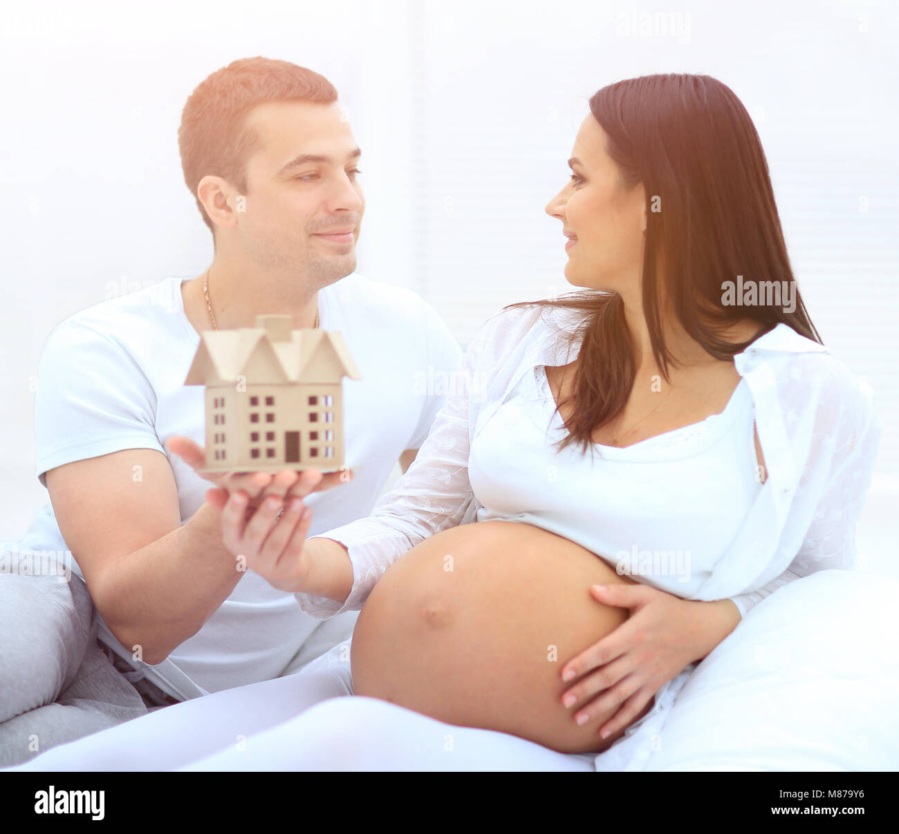 closeup.Young happy couple dreaming about future home Stock Photo - Alamy
