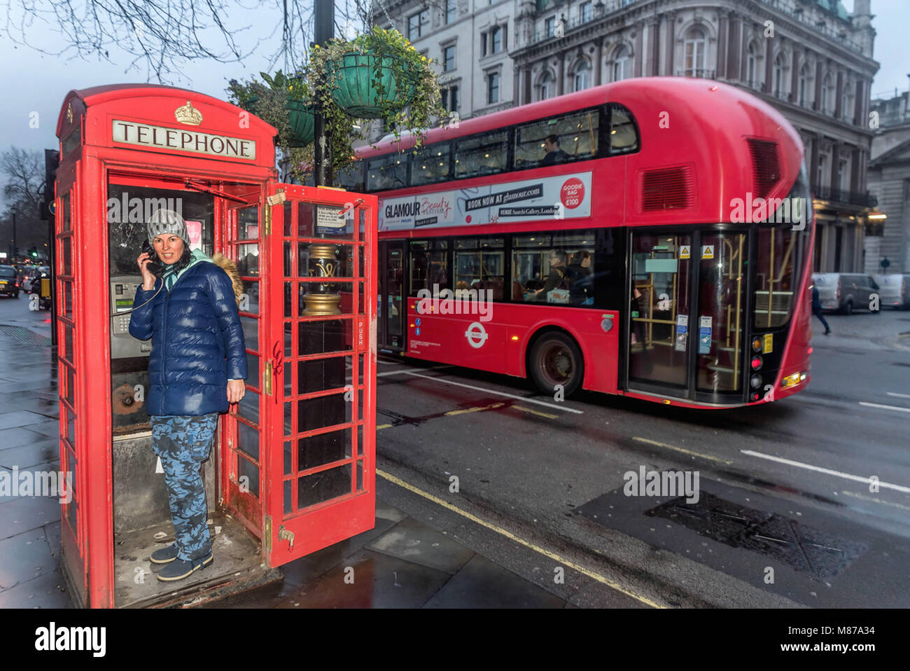 Women kid telephone booth hi-res stock photography and images - Alamy