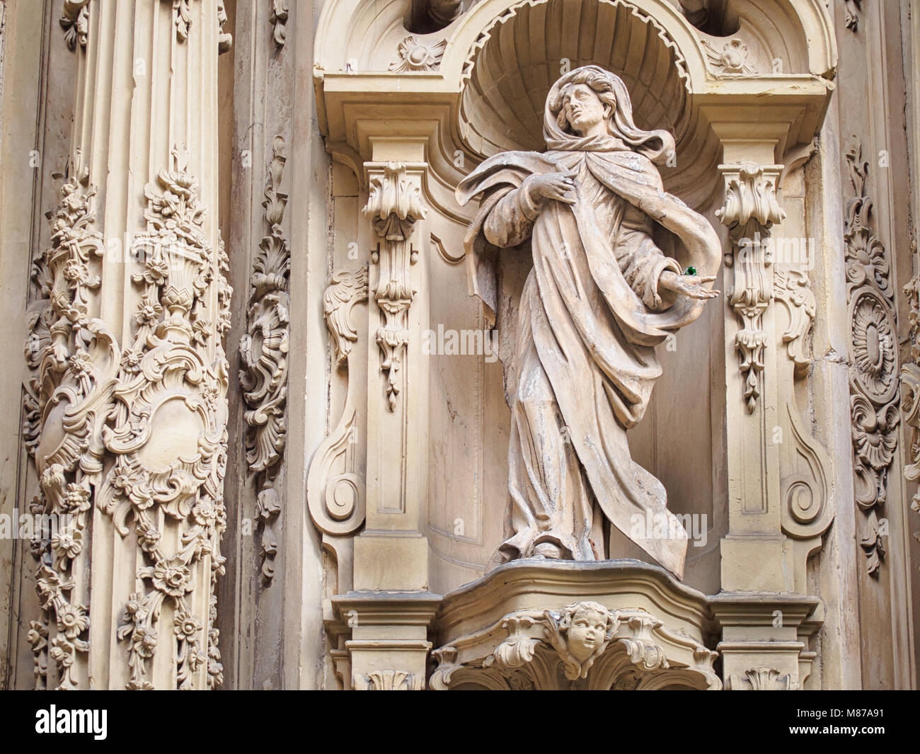 Statue of Maria on the facade of The Basilica of Saint Mary of Coro in ...