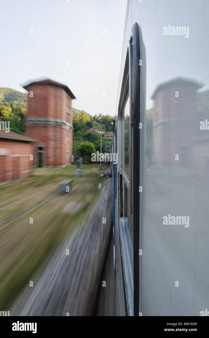View of a train leaving the station Stock Photo - Alamy