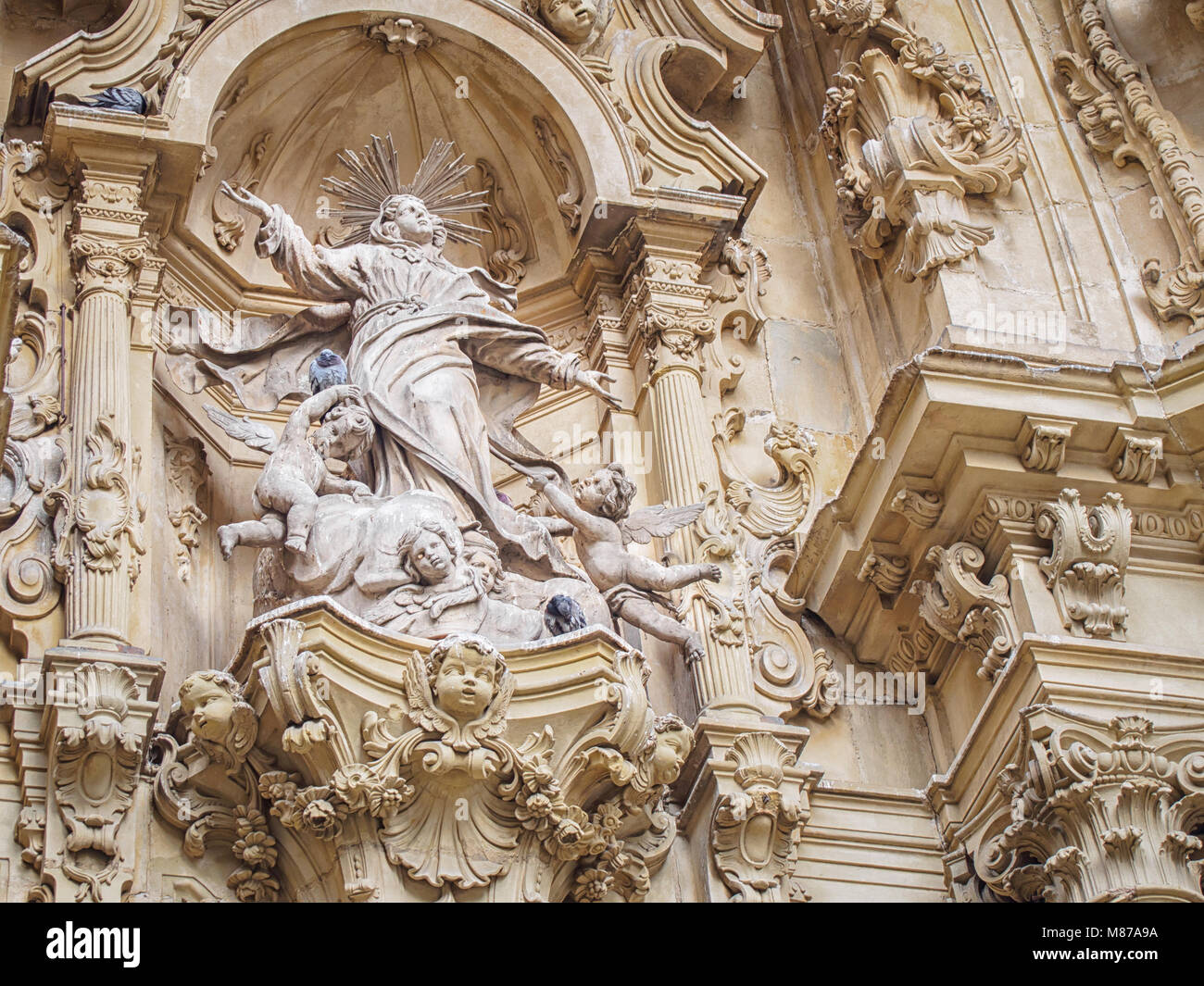 Statue of Maria on the facade of The Basilica of Saint Mary of Coro in ...