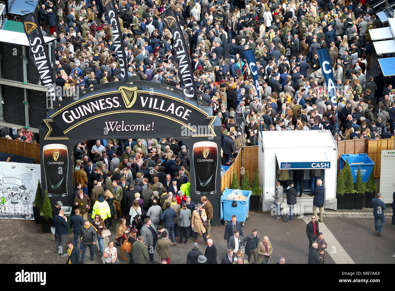 General view racegoers enjoying guinness village hi-res stock ...