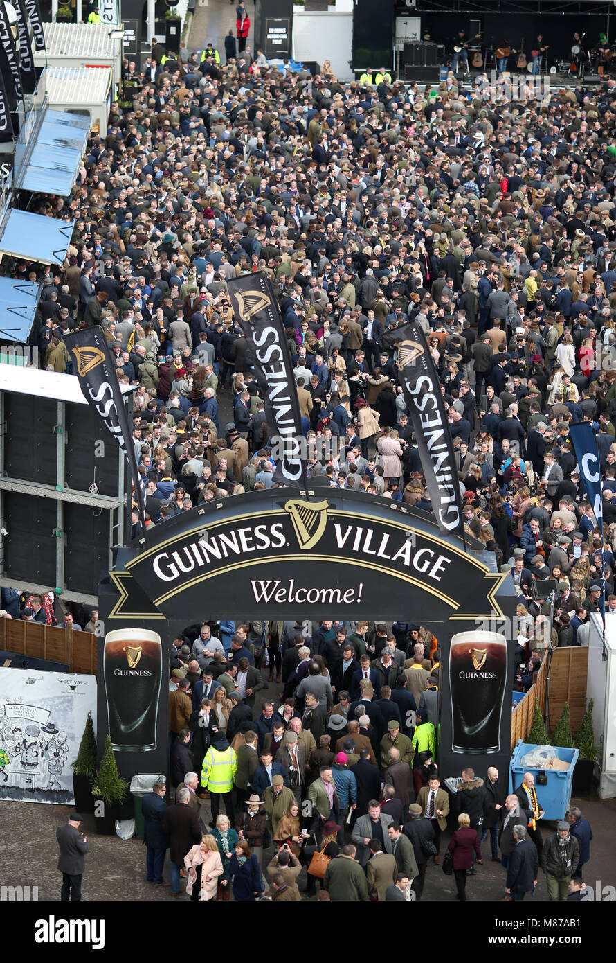 General view racegoers enjoying guinness village hi-res stock ...