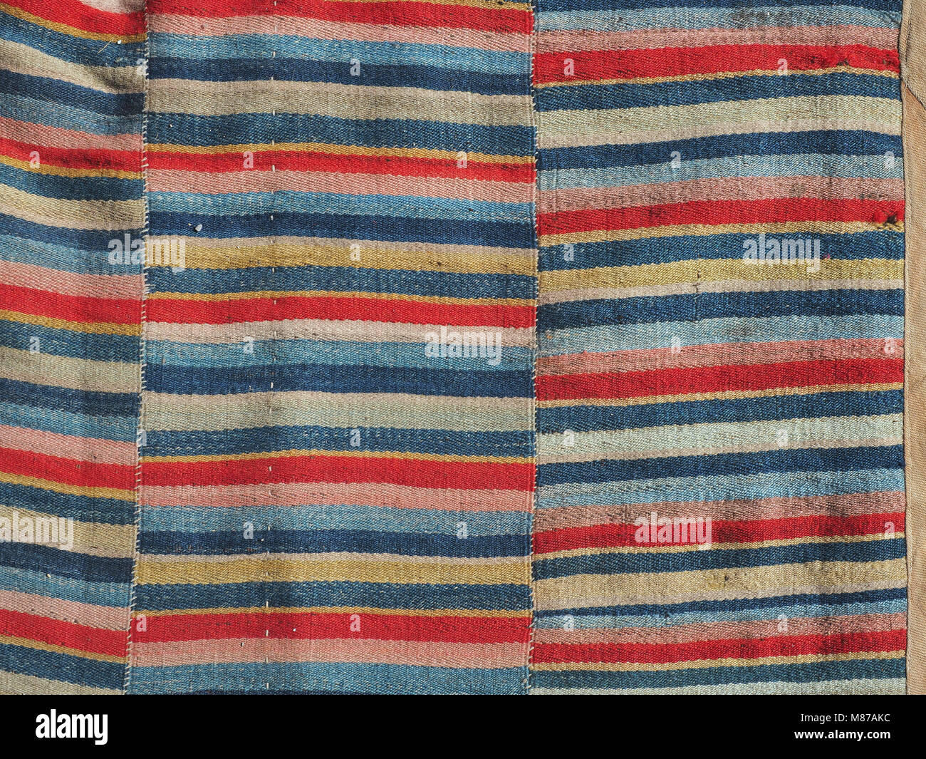 Bright striped background of cloth rug handmade, alternating horizontal ...