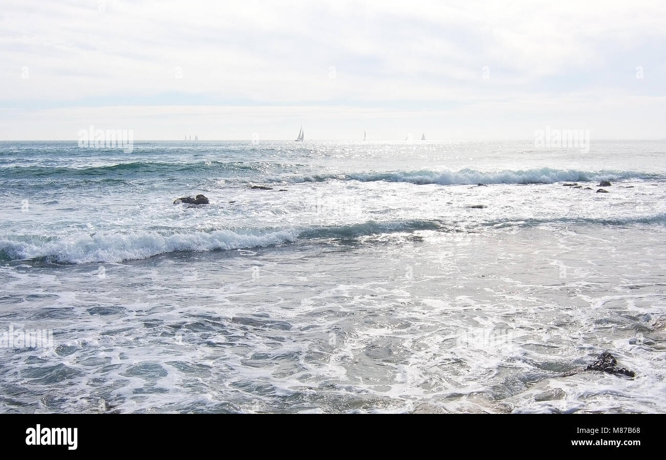 Natural Mediterranean winter seascape with waves and sails on the ...