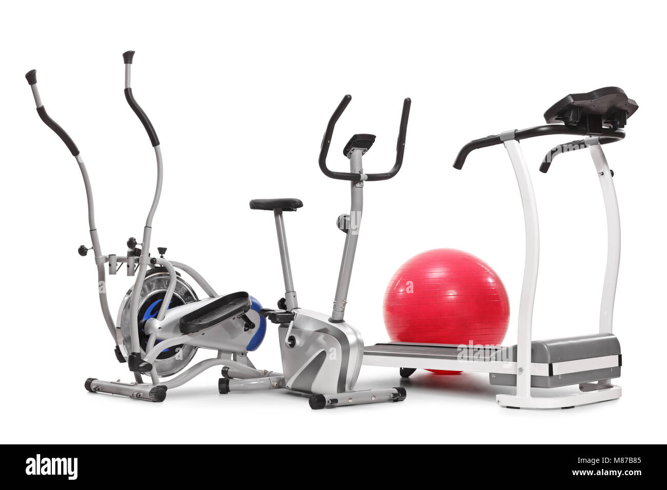Exercise machines and a pilates ball isolated on white background Stock ...