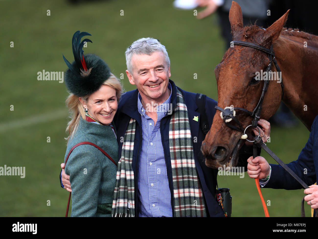 Owner Michael O'Leary celebrates after winning the Ryanair Steeple ...