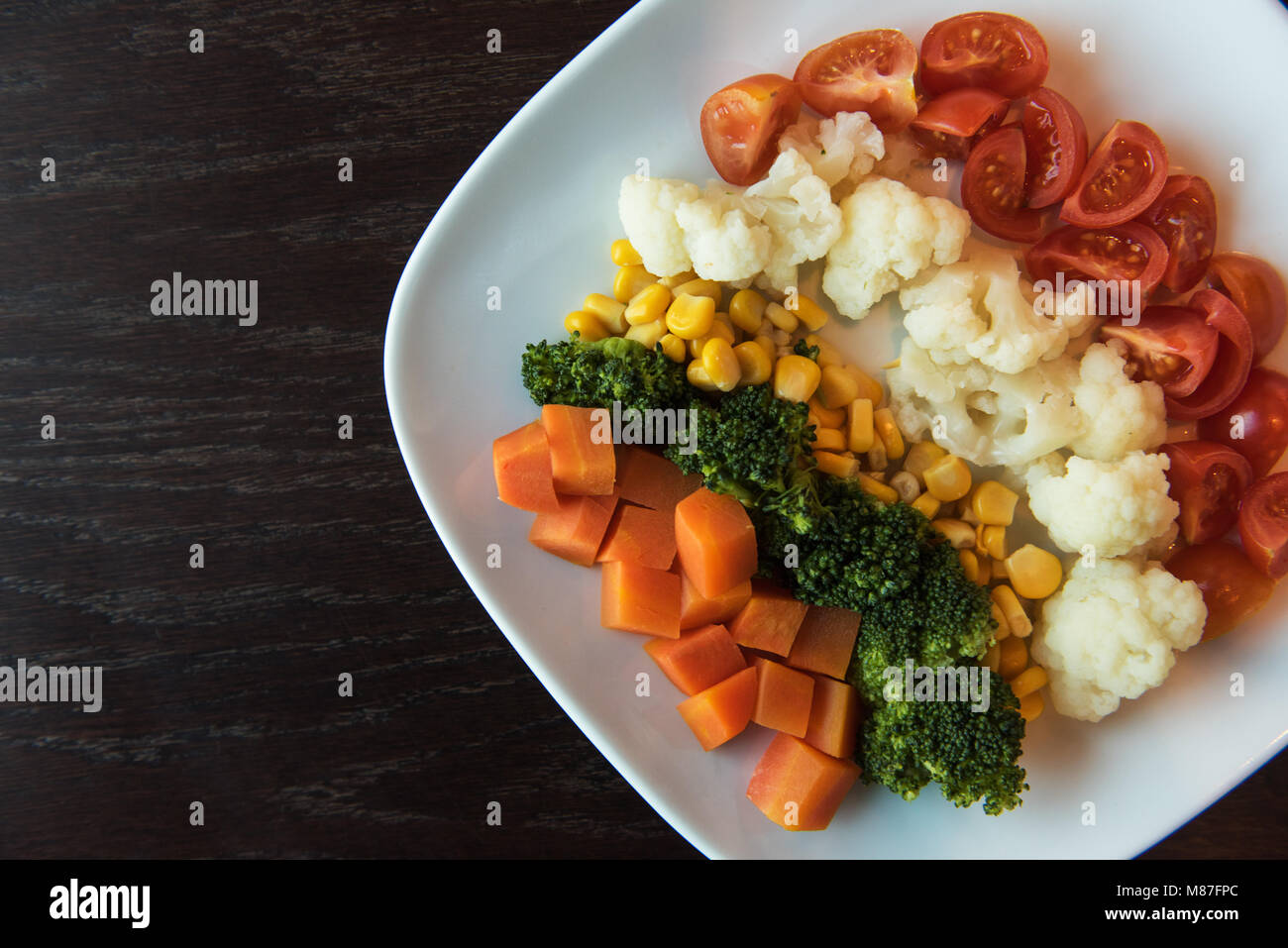 Boiled vegetables on plate Stock Photo - Alamy