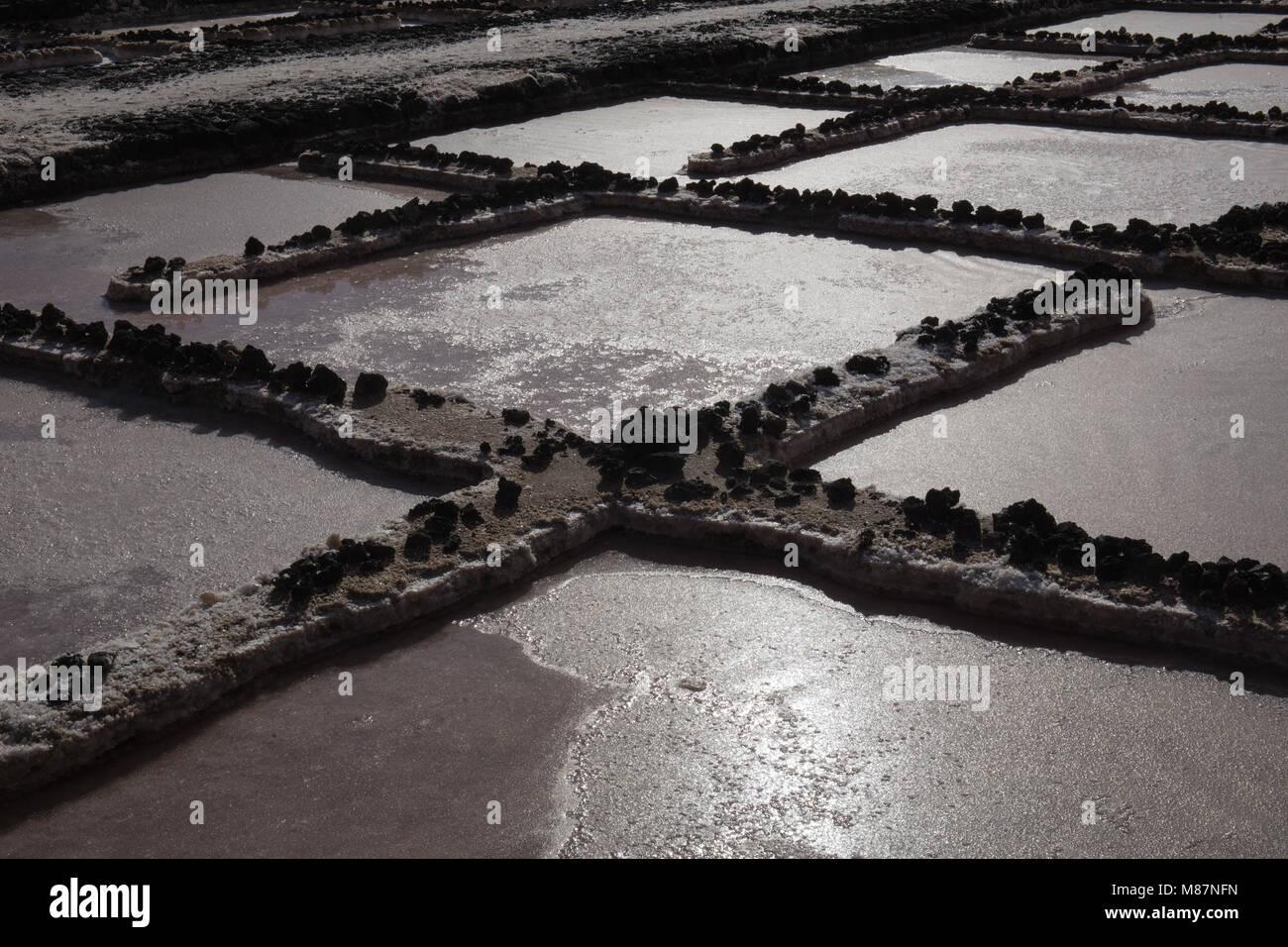 Seawater salt pans hi-res stock photography and images - Alamy