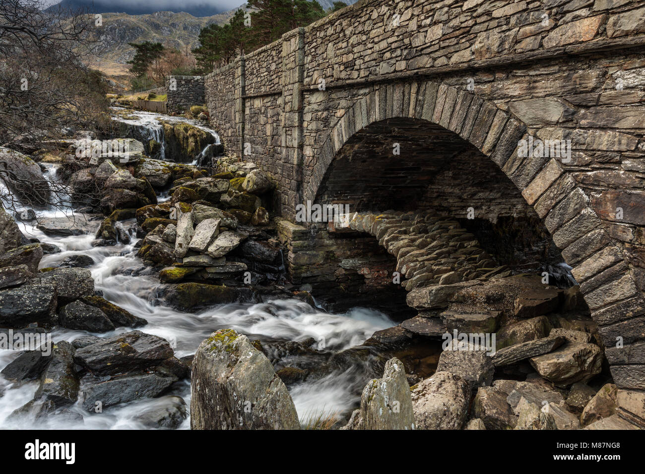 The old packhorse bridge under the main bridge at Pont Pen y Benglog ...