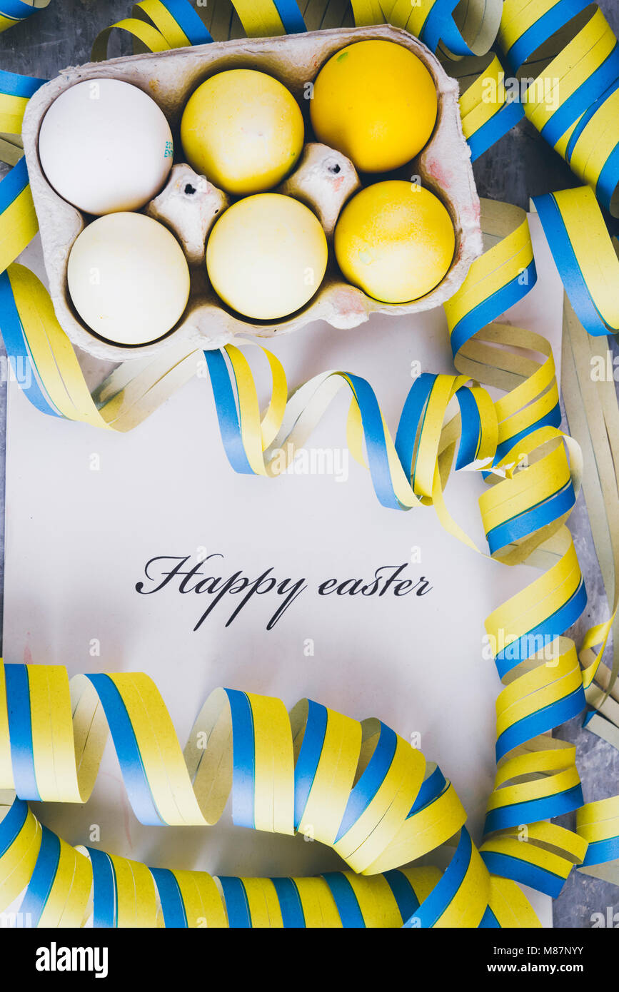 Yellow colored ombre eggs for Easter holidays, coloring using food ...