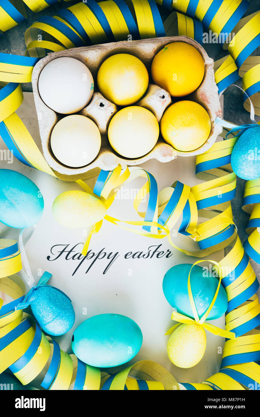 Yellow colored ombre eggs for Easter holidays, coloring using food ...