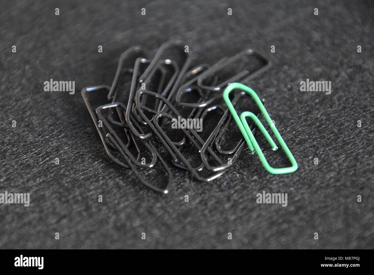 One red paperclip hi-res stock photography and images - Alamy