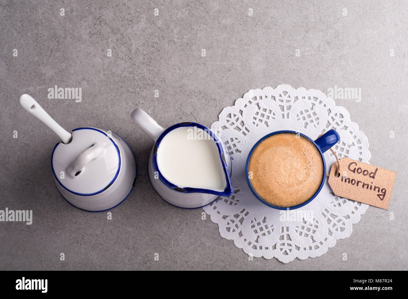 Coffe cup and note good morning. Breakfast concept. Top view. Copy ...