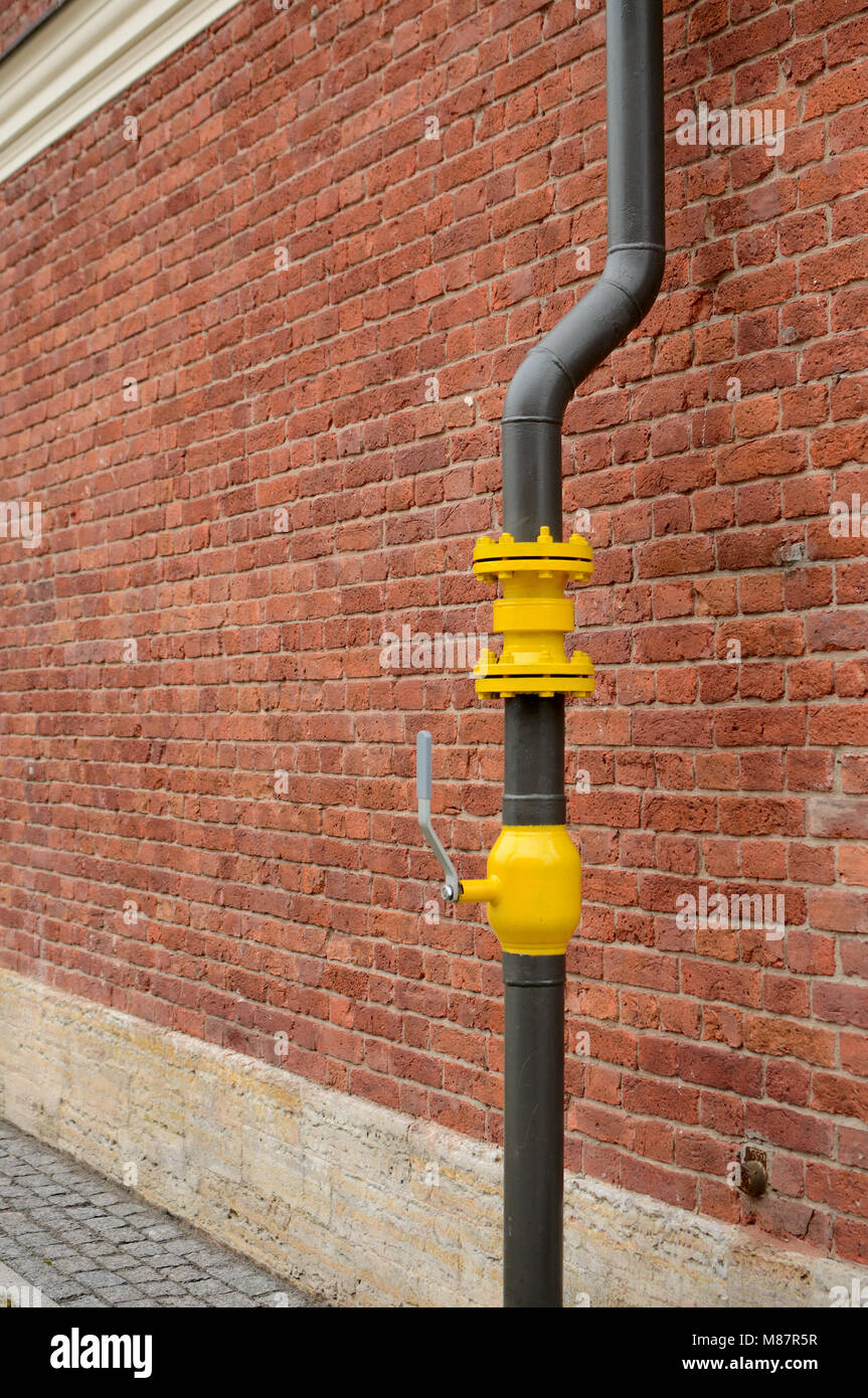 Along the wall there is a gas pipe.On the pipe the valve is installed ...