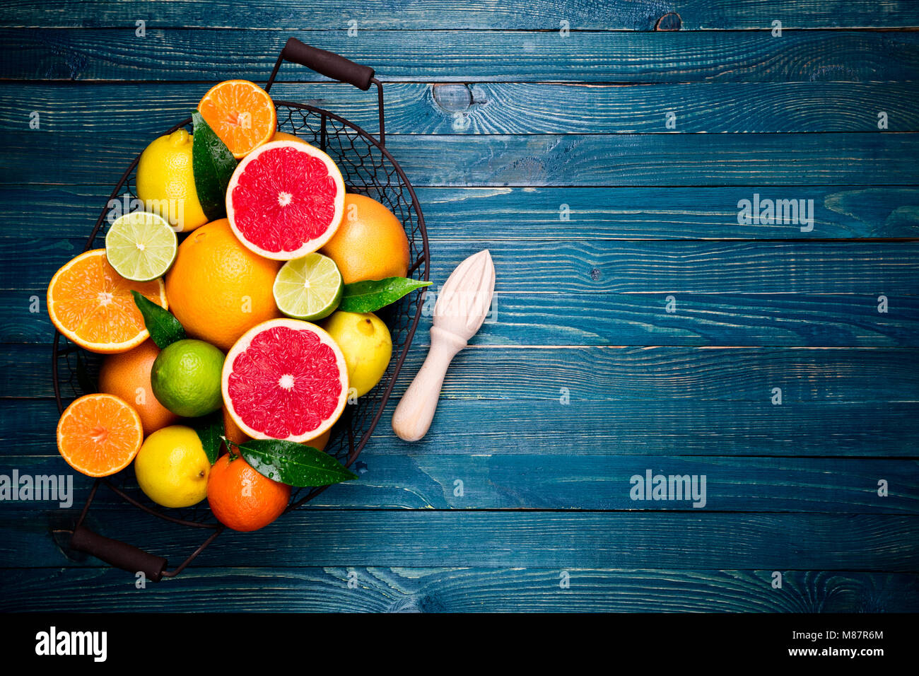 Citrus fruits and cooking citrus juice background. Assorted fresh ...