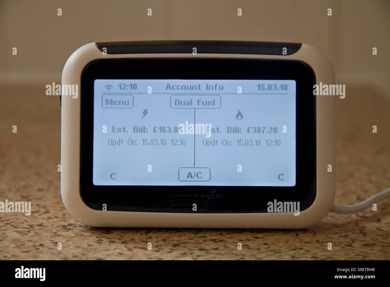 A smart meter displaying the cost of dual fuel energy consumption in ...