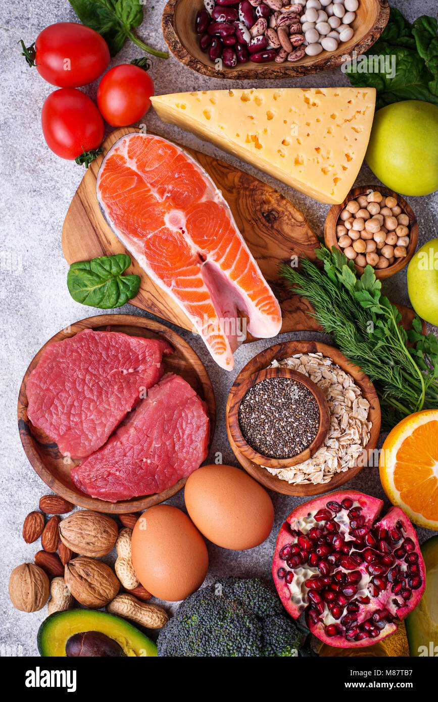 Meat, fish, legumes, nuts and vegetables Stock Photo - Alamy