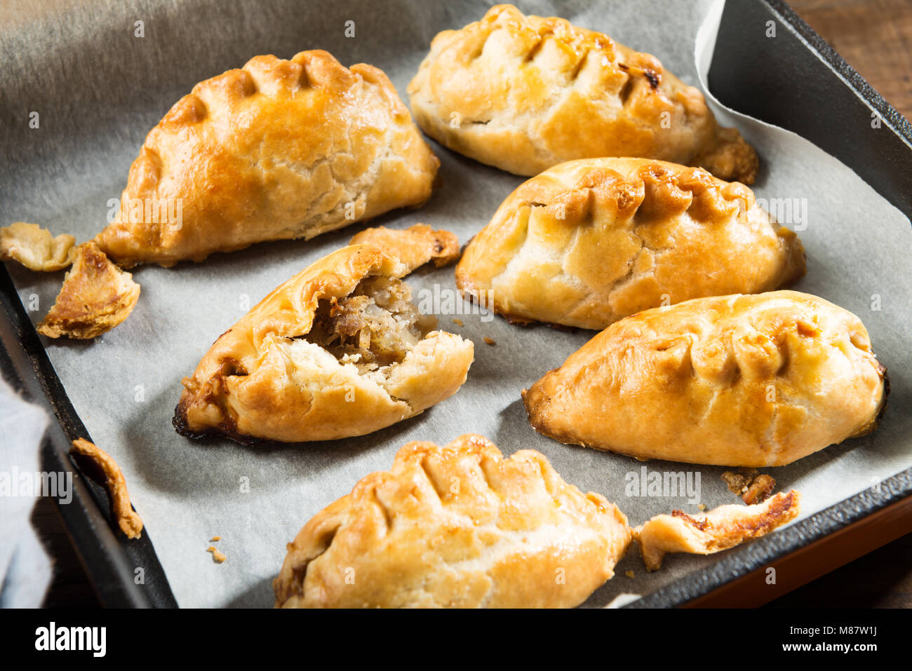Hot pasties from butter enriched puff pastry filled with minced beef ...