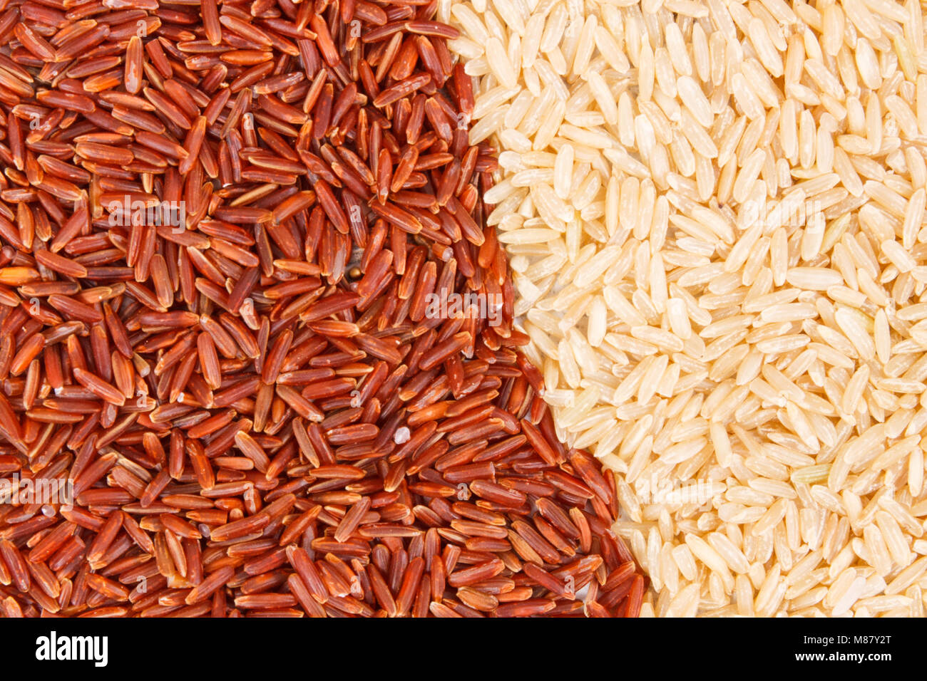Brown and red rice as background, concept of healthy, gluten free food ...