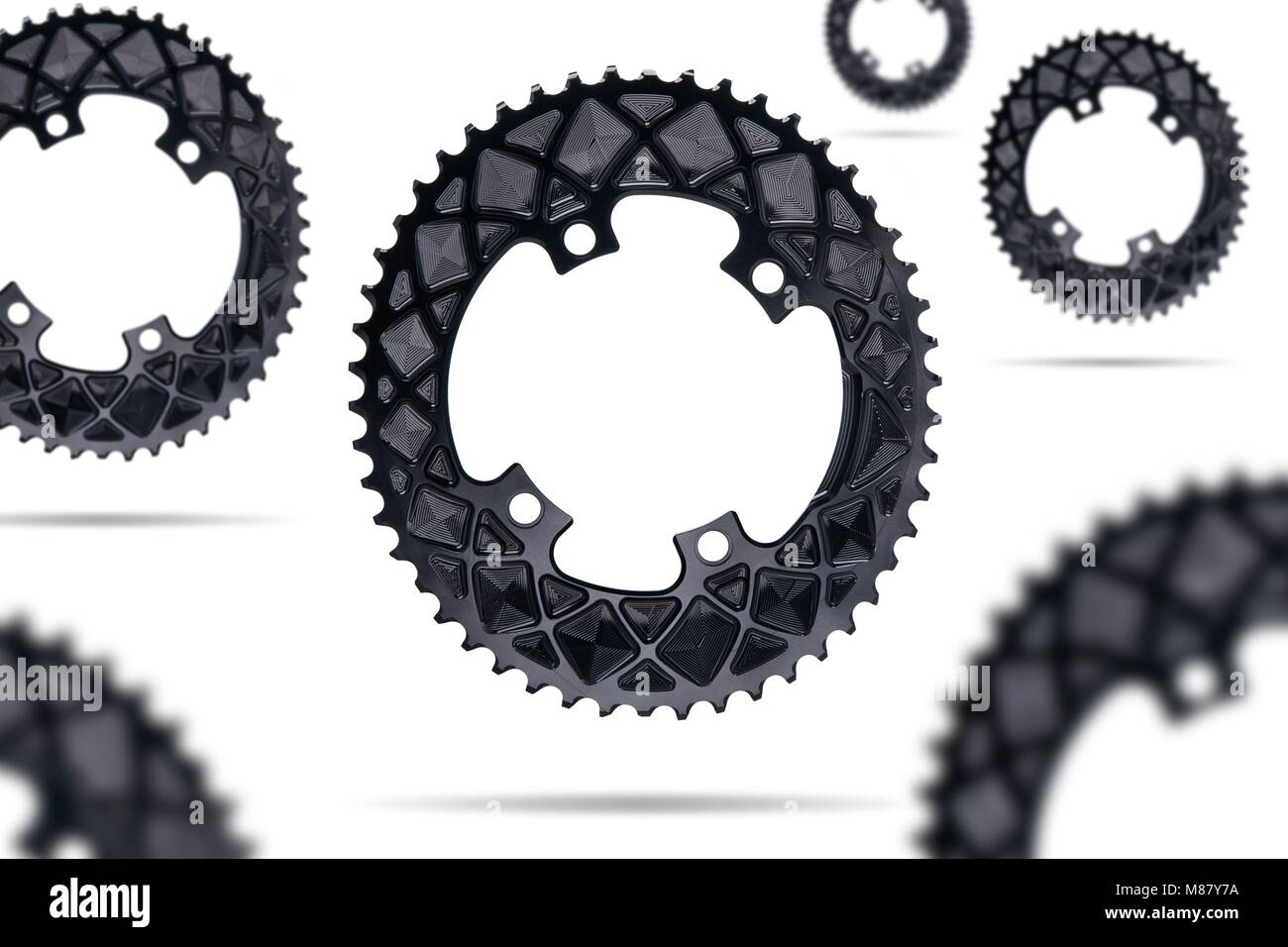 Black bicycle chainring at white background , isolated Stock Photo - Alamy