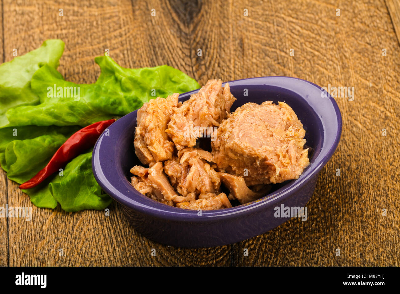 Canned tuna fish in the bowl ready for cooking Stock Photo - Alamy