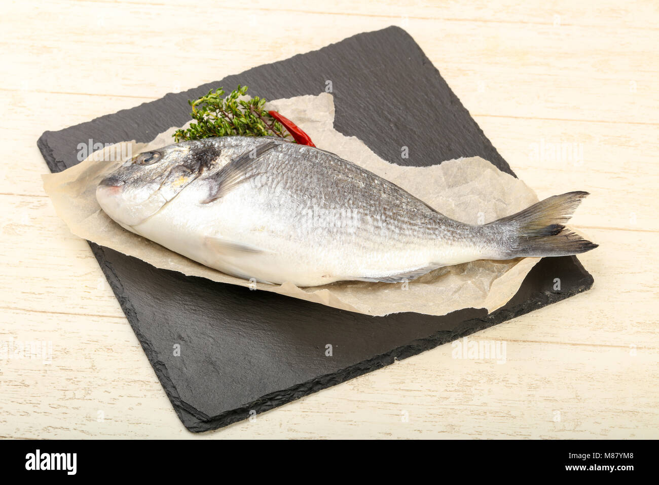 raw dorada fish - ready for cooking Stock Photo - Alamy