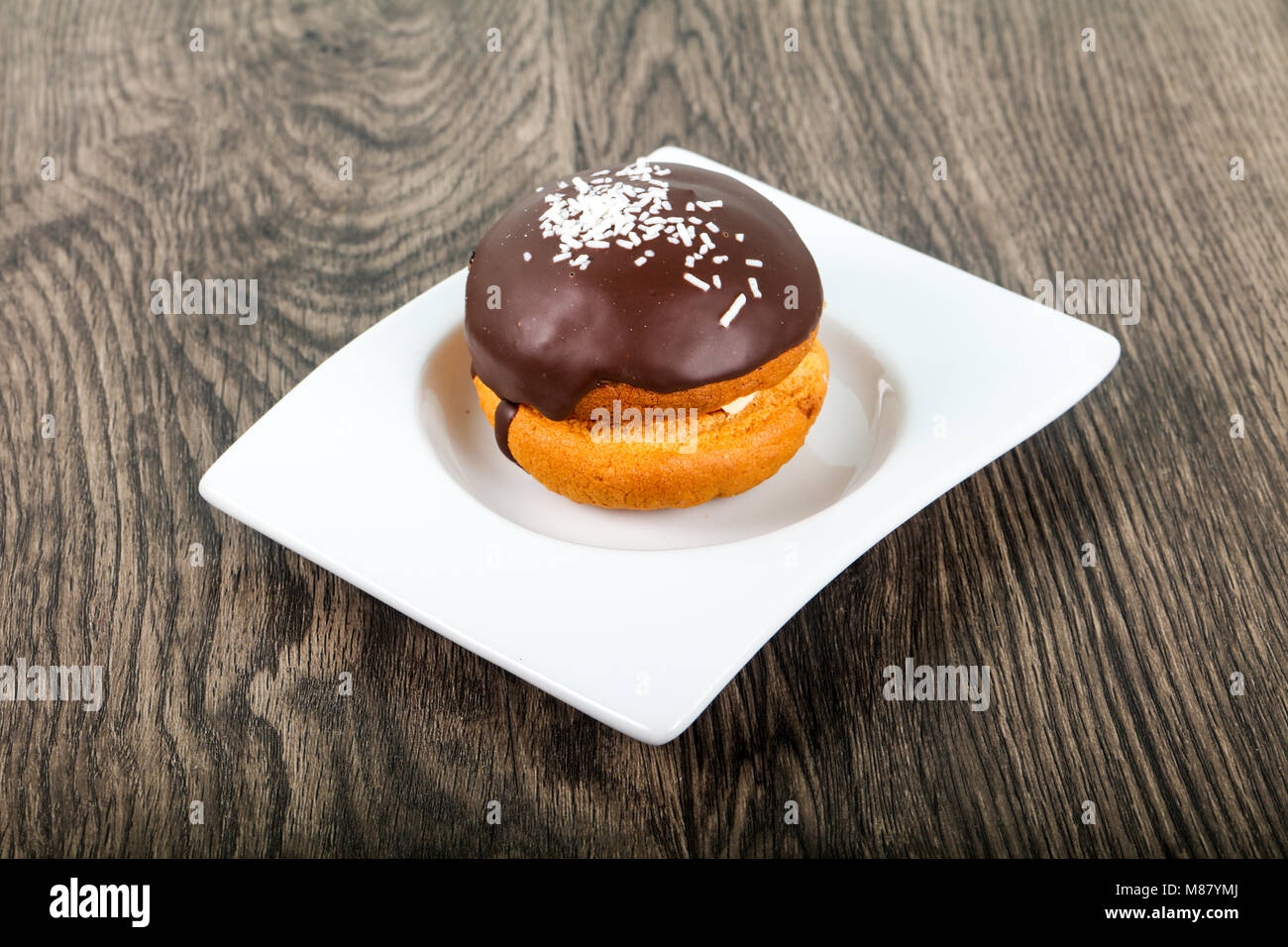 Bouchee cake with chocolate Stock Photo - Alamy