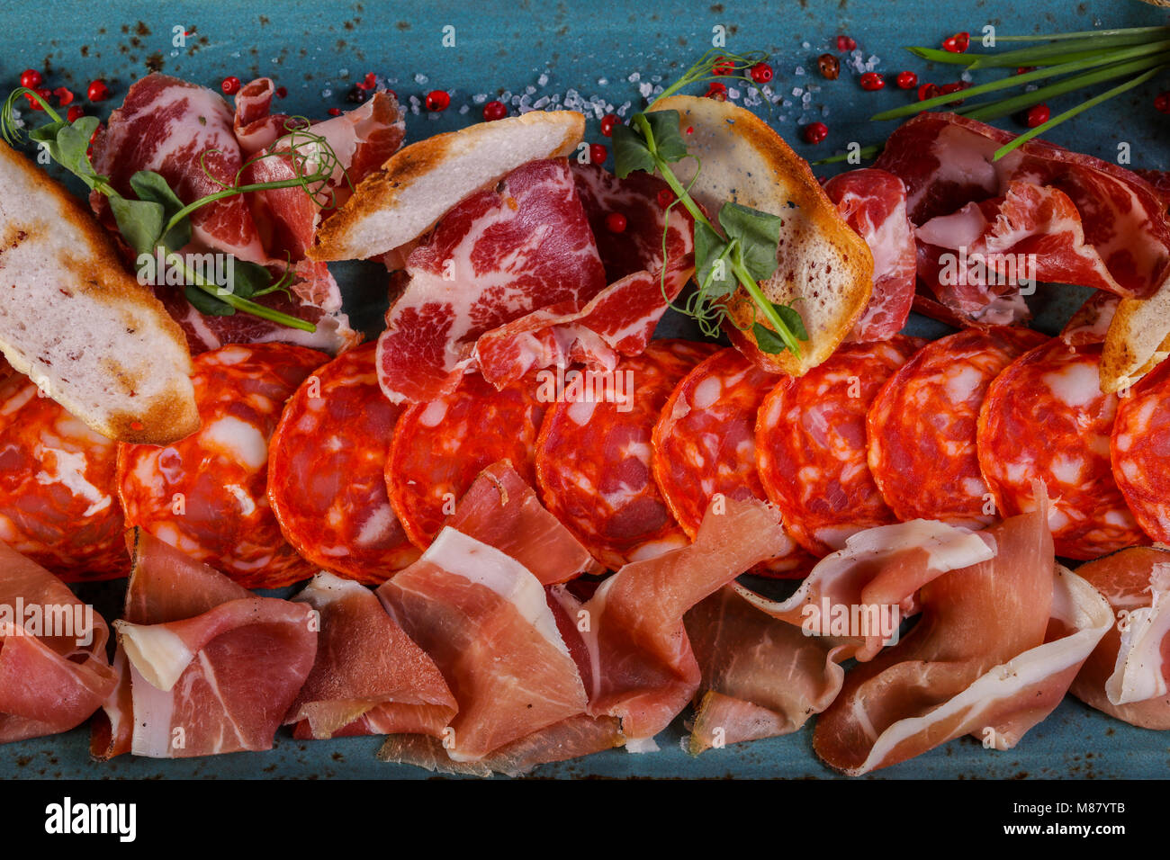 Spanish meat plate - hamon, serrano, chorizzo Stock Photo - Alamy