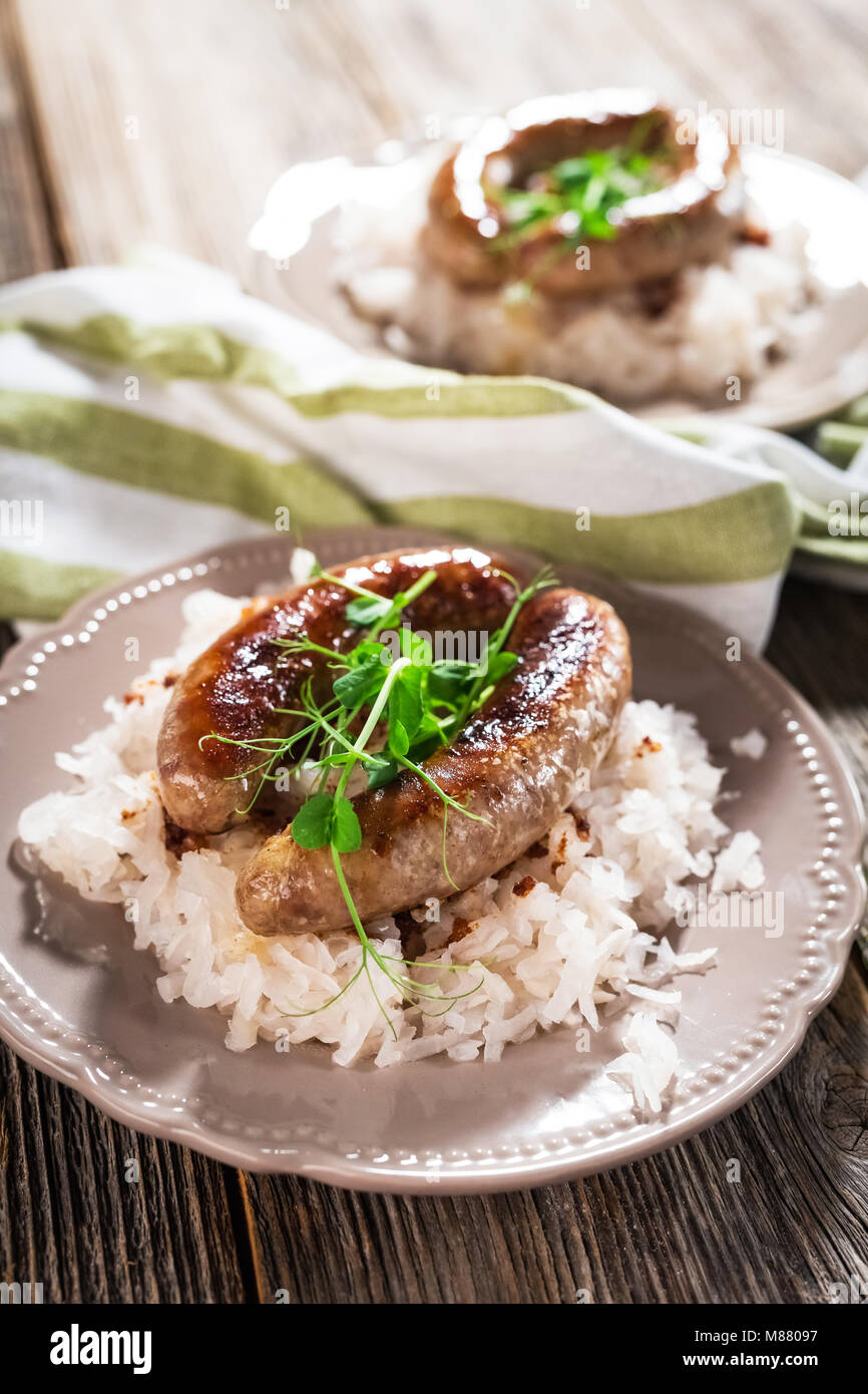 Sausage and sour turnips on rustic background Stock Photo - Alamy