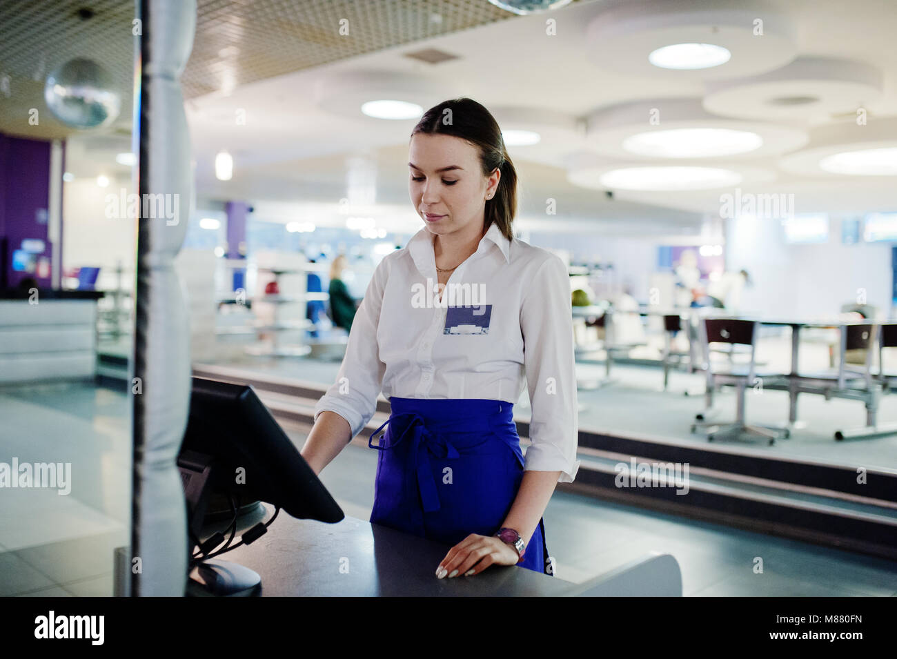 Waiter girl working with pos terminal or cashbox at cafe. People and ...