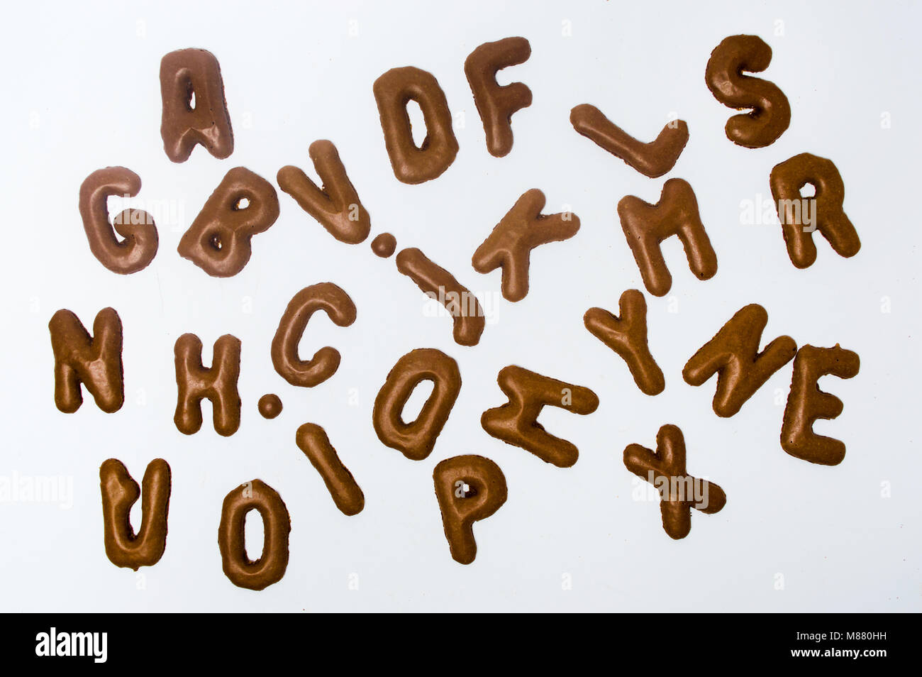 Alphabet made of chocolate cookies white background Stock Photo - Alamy