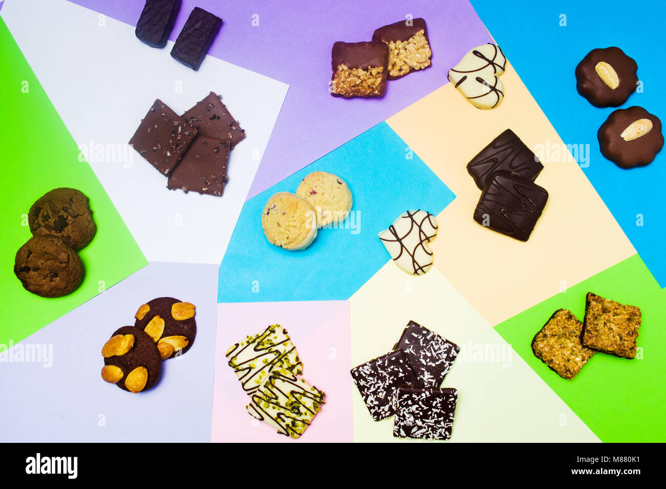 Cookies pastel colored background with various biscuits flat lay Stock ...