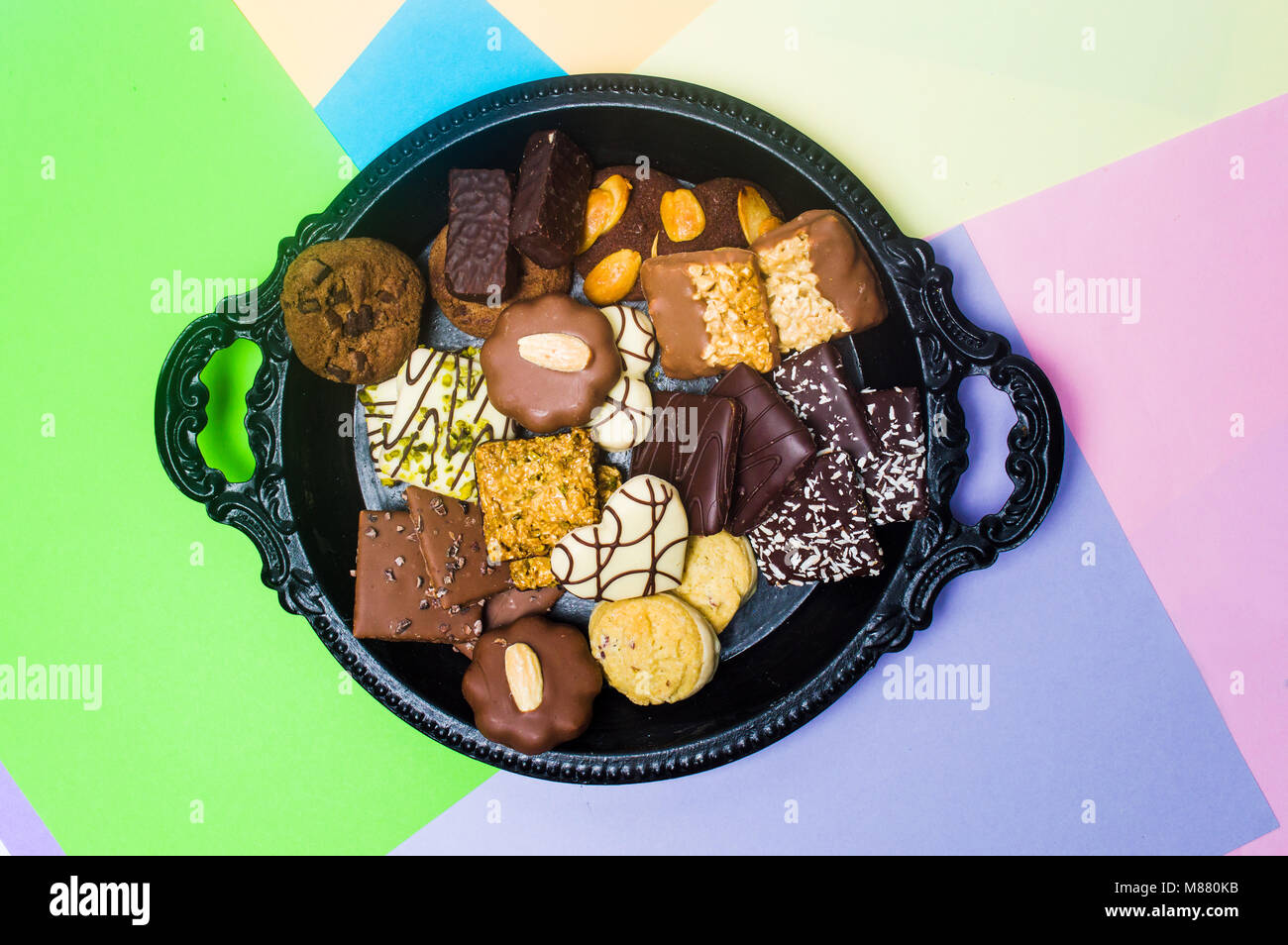 Various chocolate cookies on a plate top view Stock Photo - Alamy