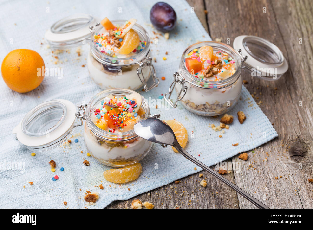 Healthy breakfast overnight oats with fresh fruit in a glass jar Stock ...