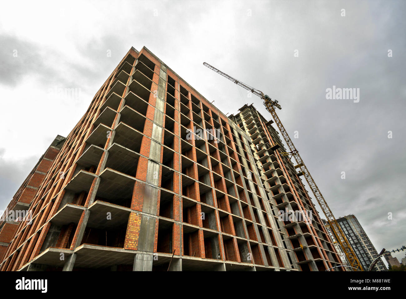 Ground view of a new modern residential house building under ...