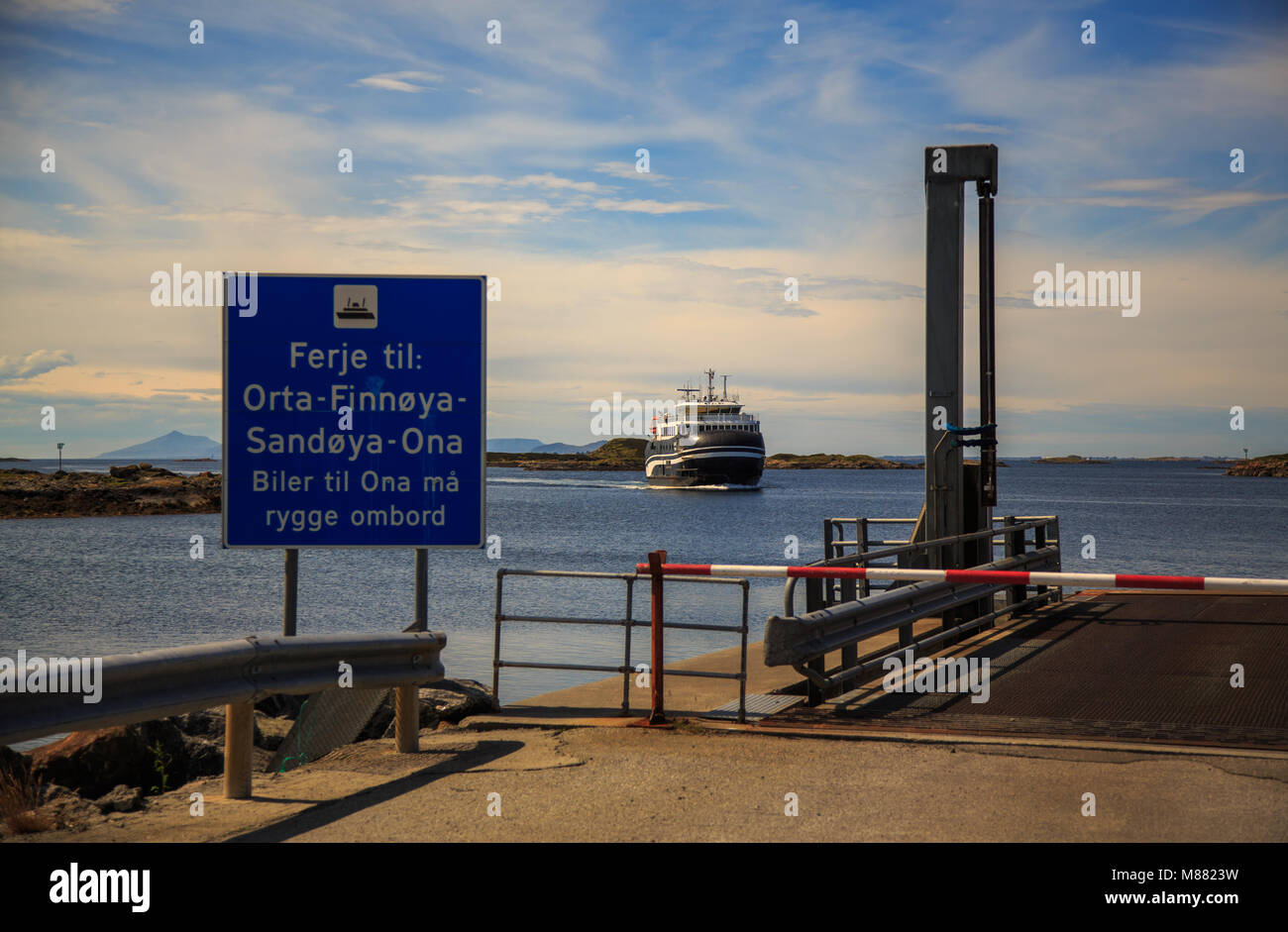 Ferry approaching the ferry pier in Småge, Aukra, Molde, Norway. Ferry ...